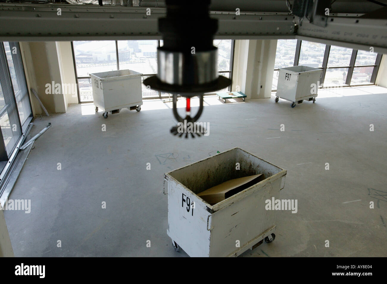 Fire sprinklers and trash bins in highrise office building construction ...