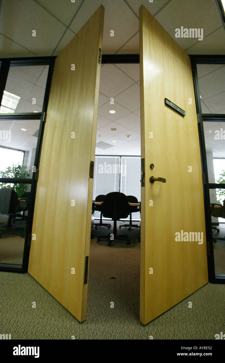 Doors are open to empty highrise building conference room Stock Photo ...