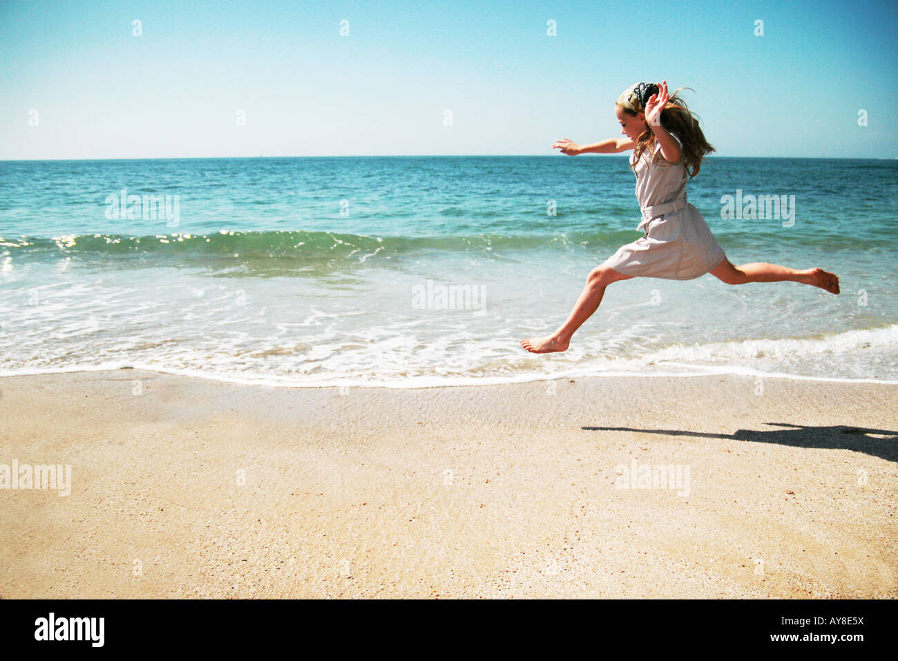 Girl leaping hi-res stock photography and images - Alamy