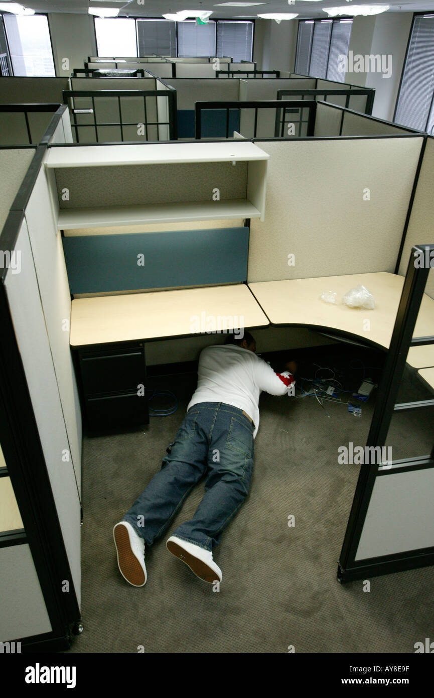 Installation of ethernet cable in hi rise office building Stock Photo ...