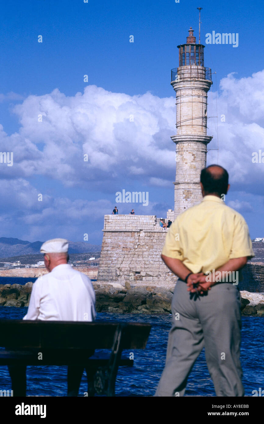 Men and Lighthouse Hania Crete Greece Stock Photo - Alamy