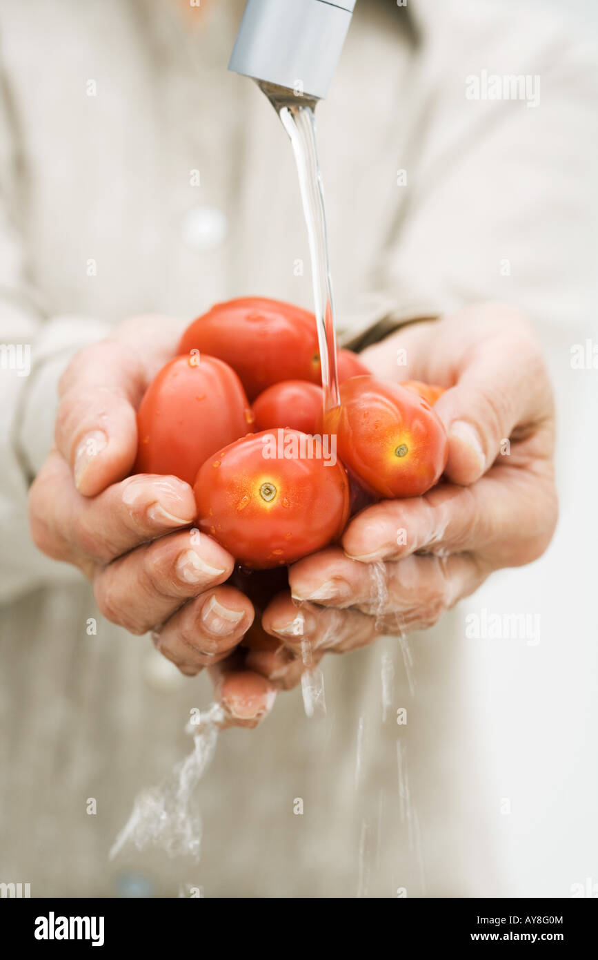 Water dripping from cupped hands hi-res stock photography and images ...