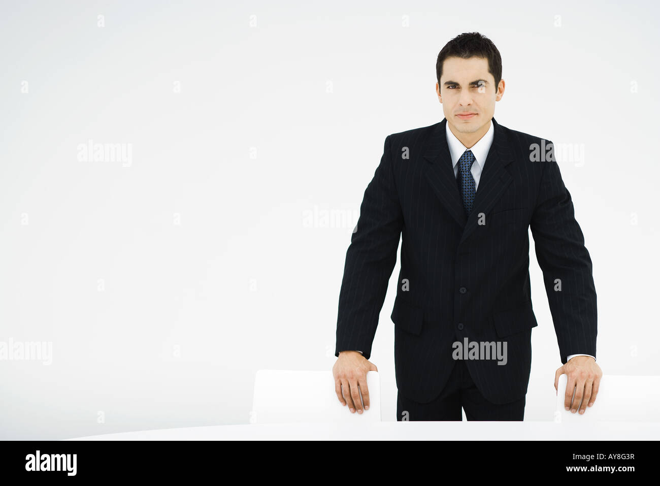 Man leaning against chair looking hi-res stock photography and images ...