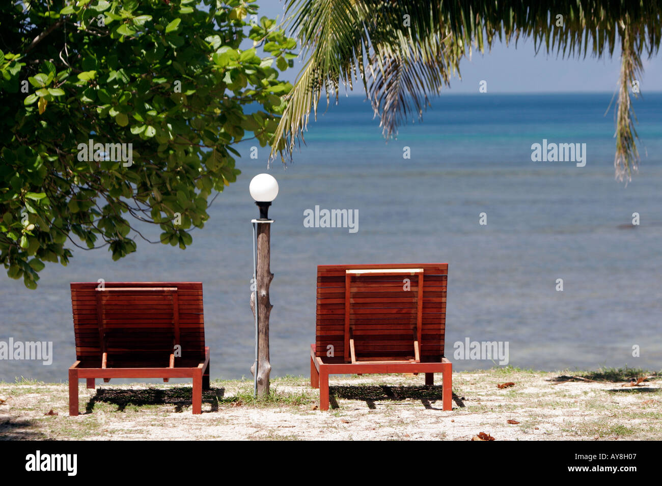 Beach sun loungers Libong Beach Resort Ko Libong island Thailand Stock ...