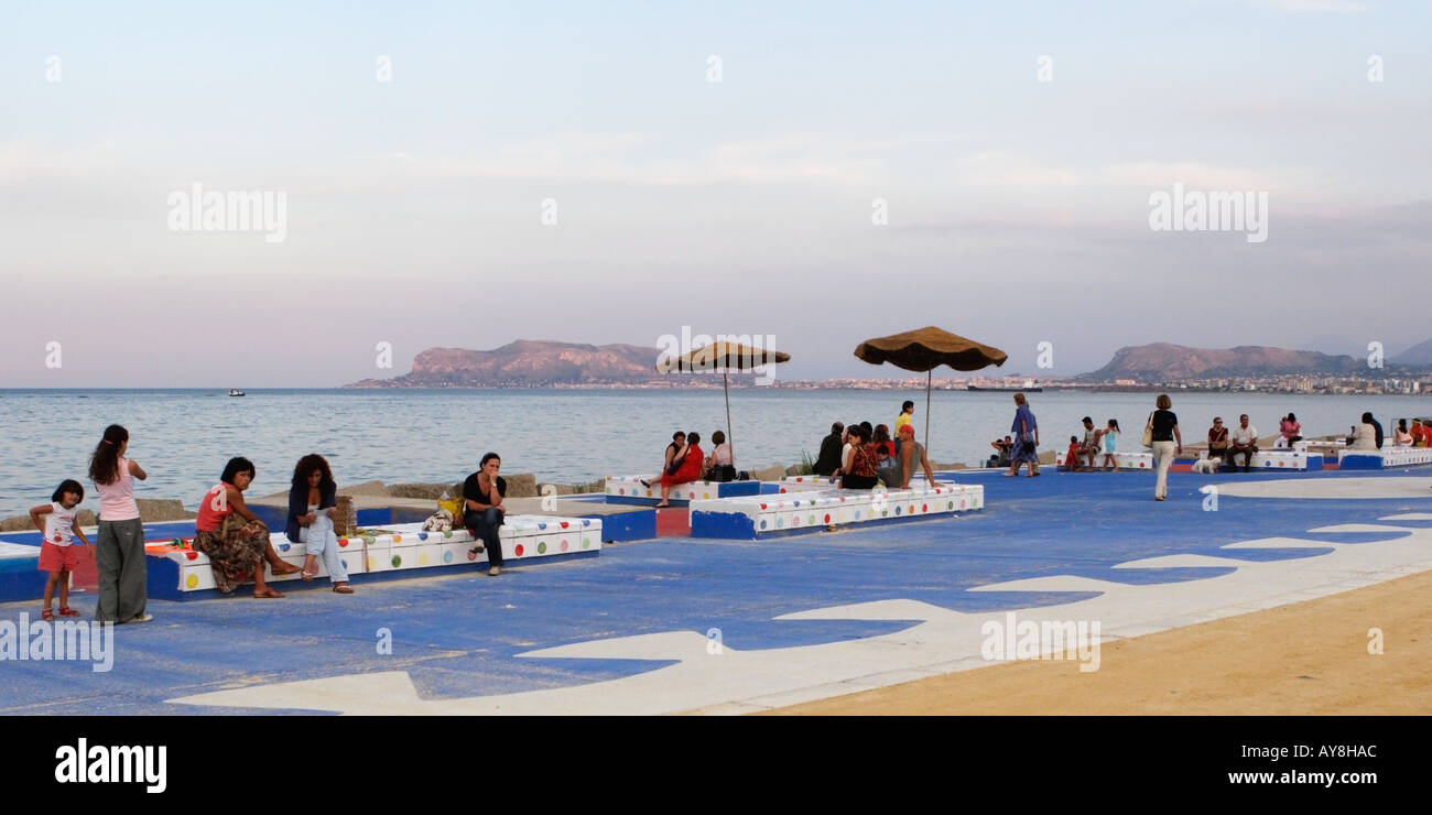 people relaxing at seaside recreation area Stock Photo - Alamy