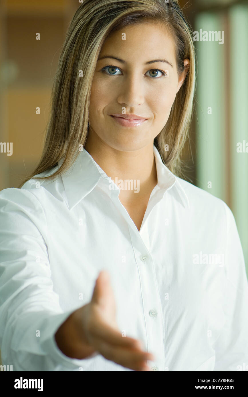 Woman offering hand, smiling at camera, personal perspective Stock ... Woman offering hand, smiling at camera, personal perspective Stock ...