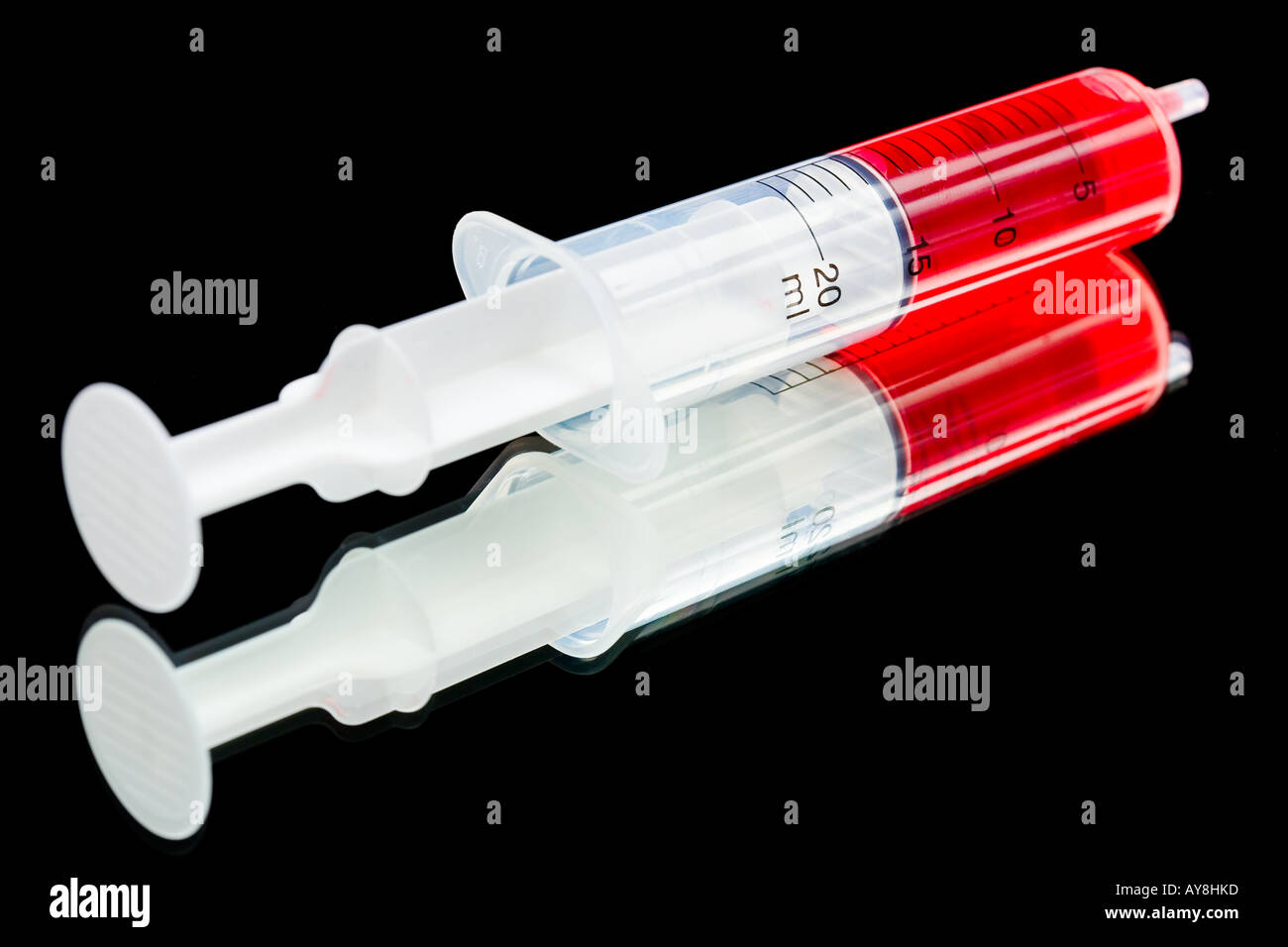 Injection needle syringe red fluid hi-res stock photography and images ...