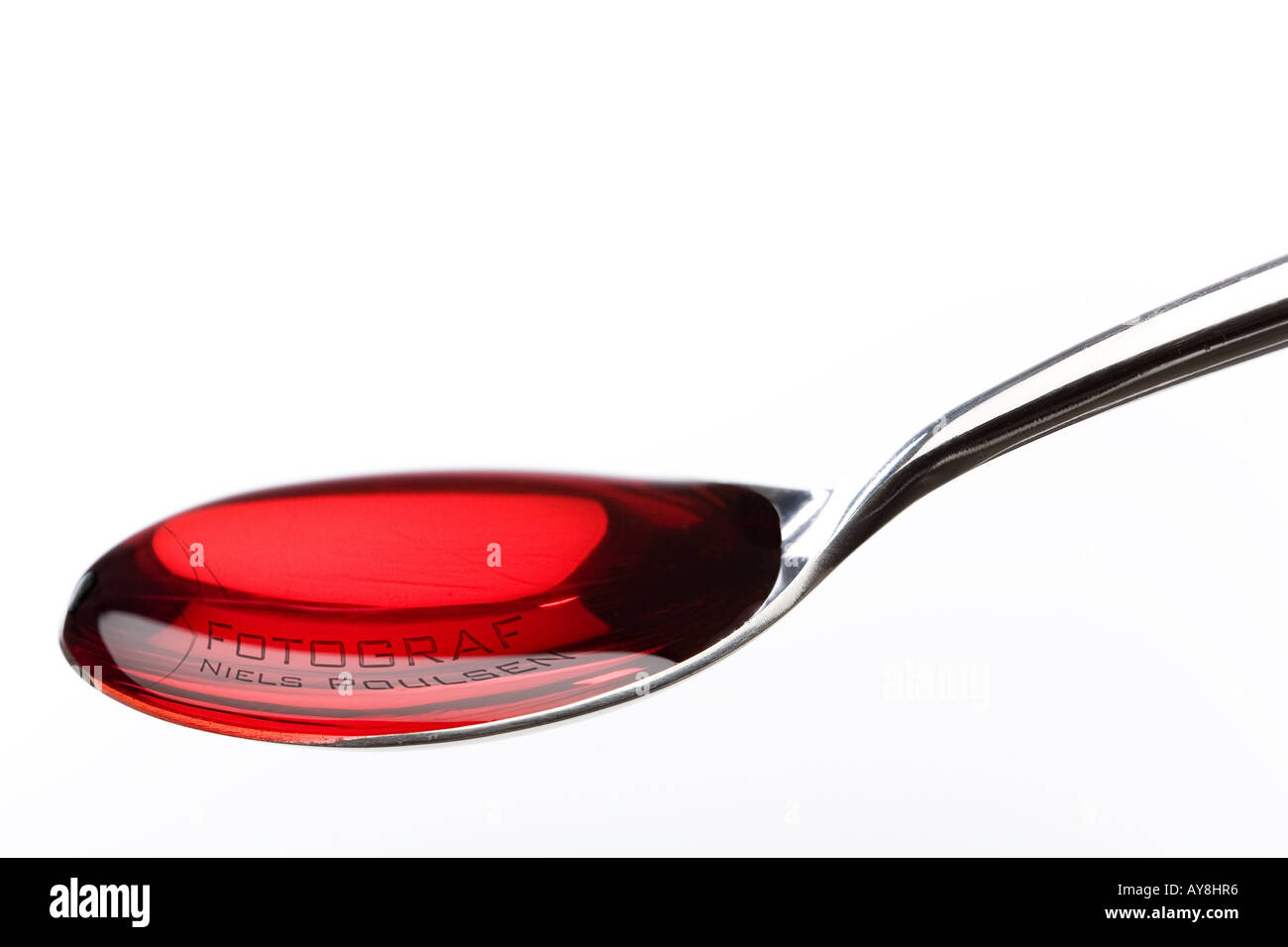 Spoonful medicine red liquid medicine hi-res stock photography and ...