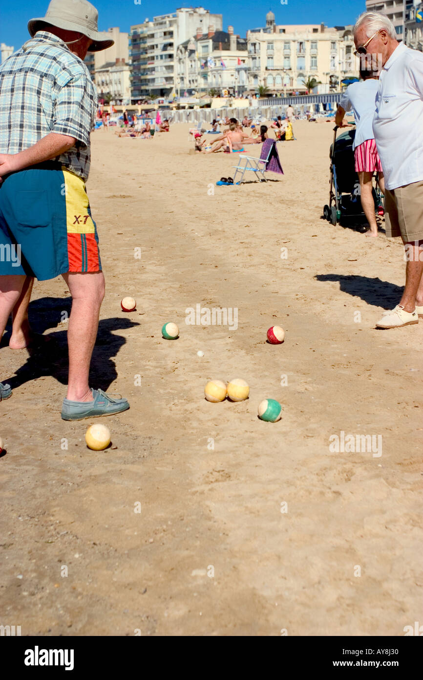 French people playing boules on beach in summer vacation Stock Photo ...