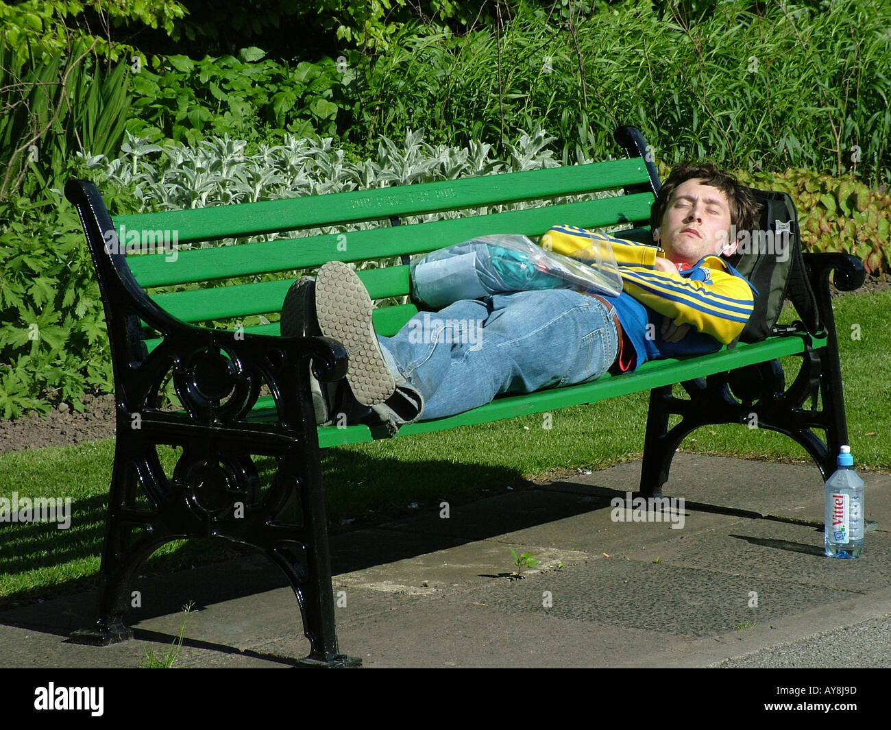 Sleeping on park bench, Bute Park, Cardiff Town Centre, South Wales ...