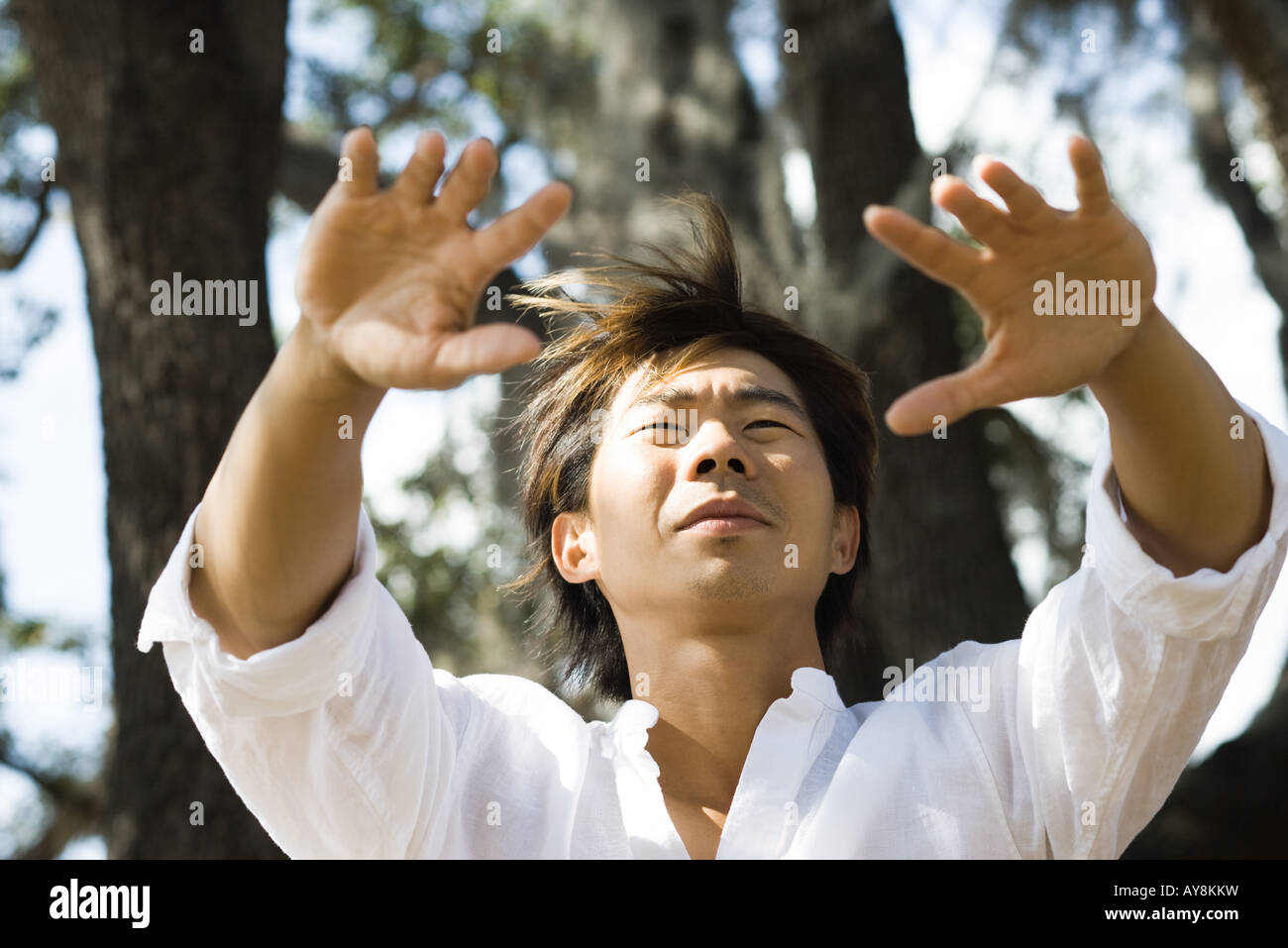 Man standing with arms out hi-res stock photography and images - Alamy