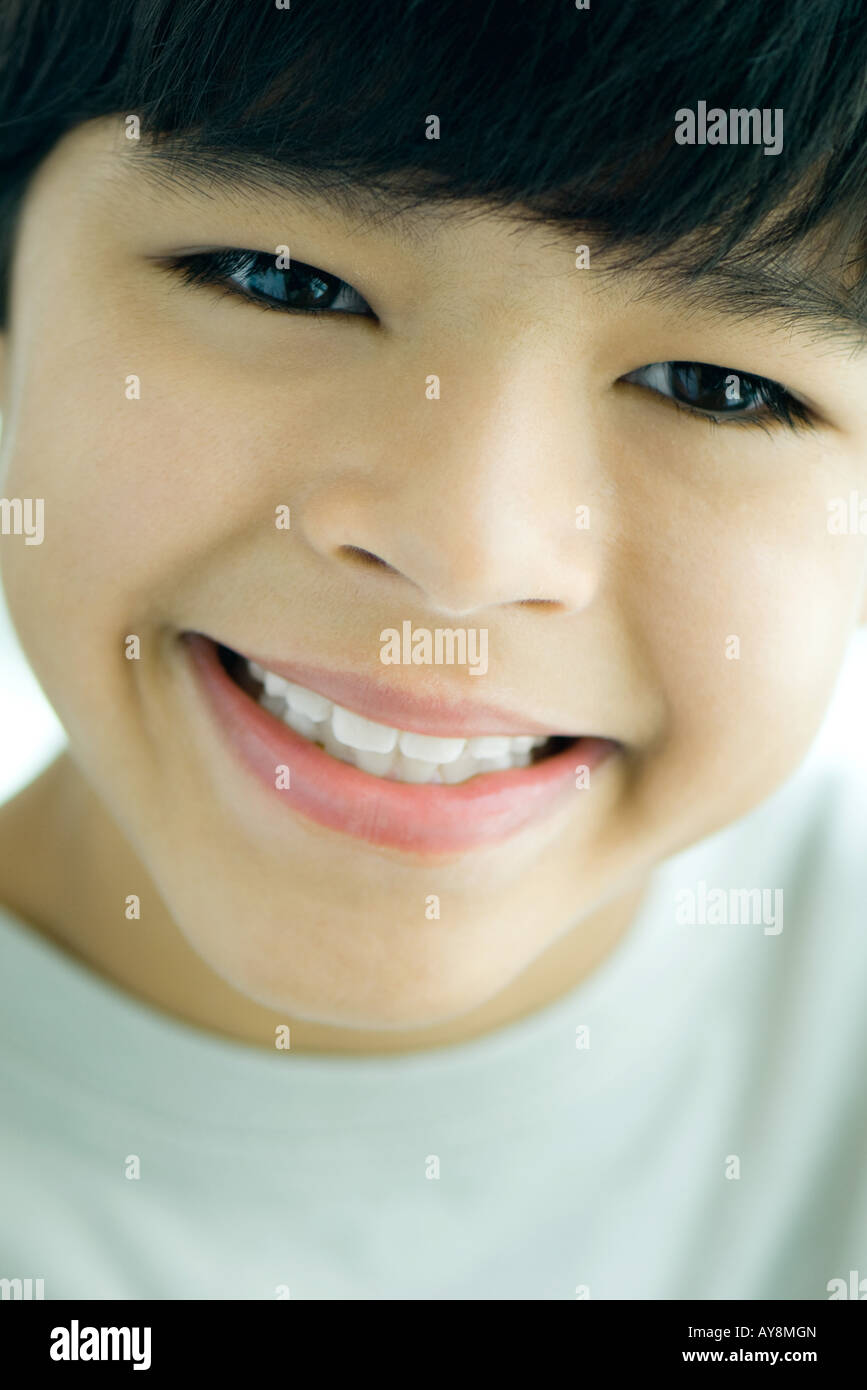 Boy smiling at camera, portrait, close-up Stock Photo - Alamy