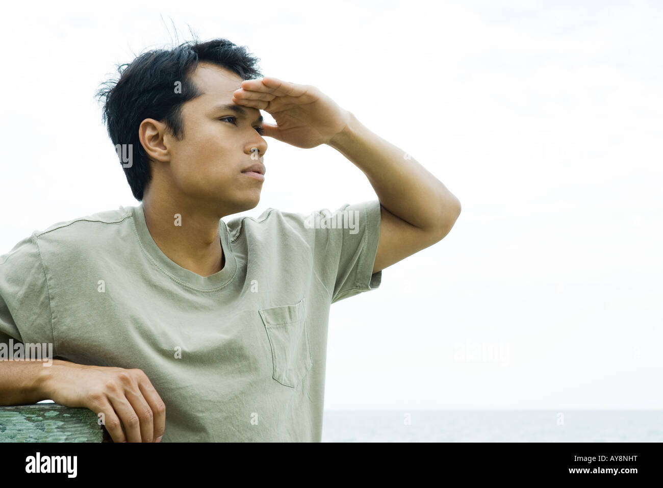 Man Shading His Eyes High Resolution Stock Photography and Images - Alamy