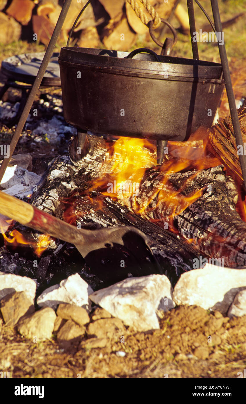 Cooking breakfast in a cast-iron pot over a wood fire, at the Lincoln ...