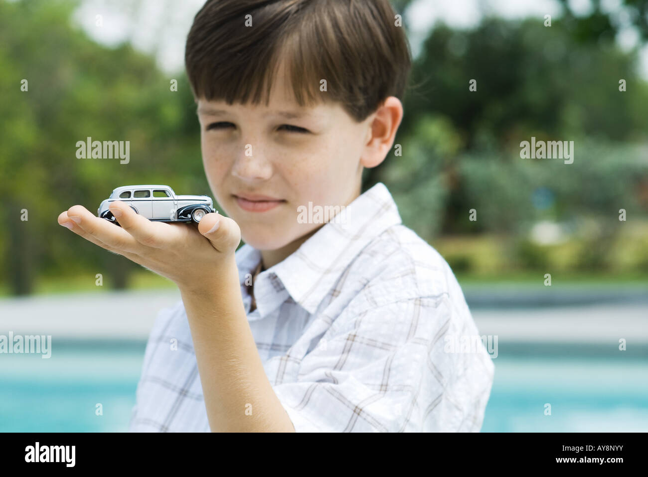 Kids hand holding toy car hi-res stock photography and images - Alamy