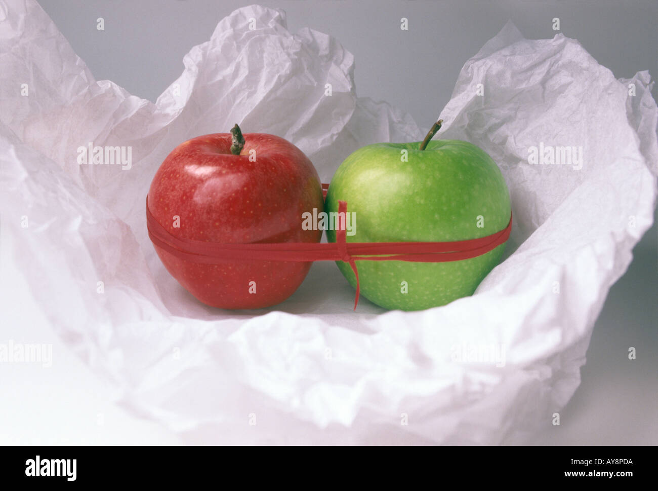 Wrapping apples in paper hi-res stock photography and images - Alamy
