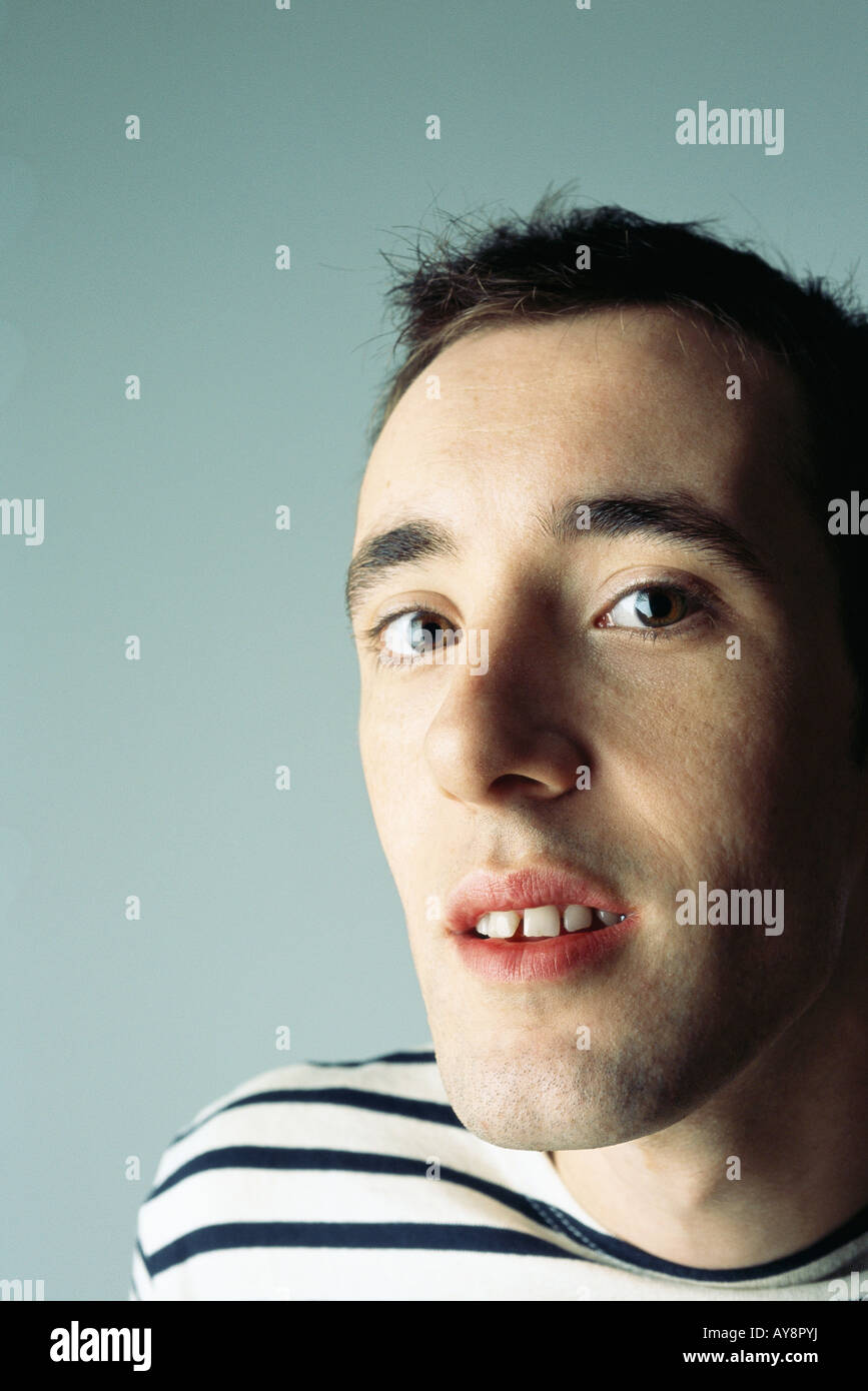 Male looking at camera, close-up, portrait Stock Photo - Alamy