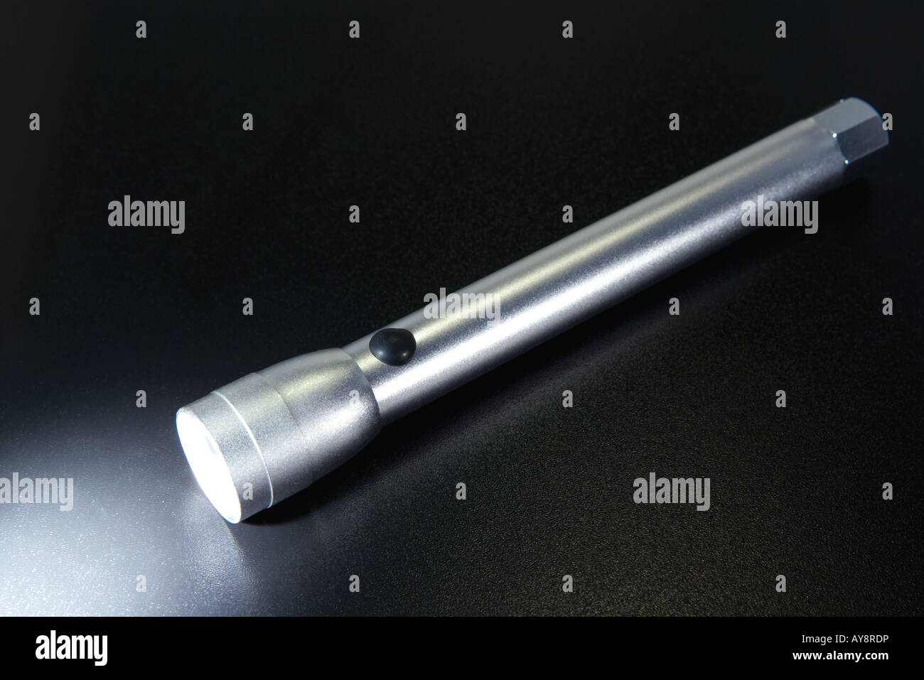Flashlight, turned on, close-up Stock Photo - Alamy