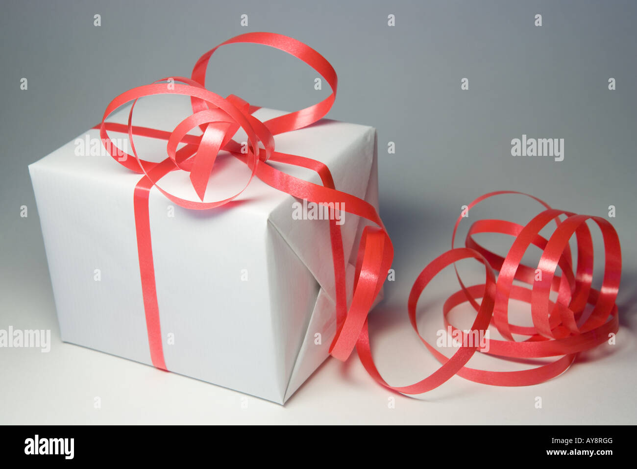 Gift wrapped in ribbon, close-up Stock Photo - Alamy