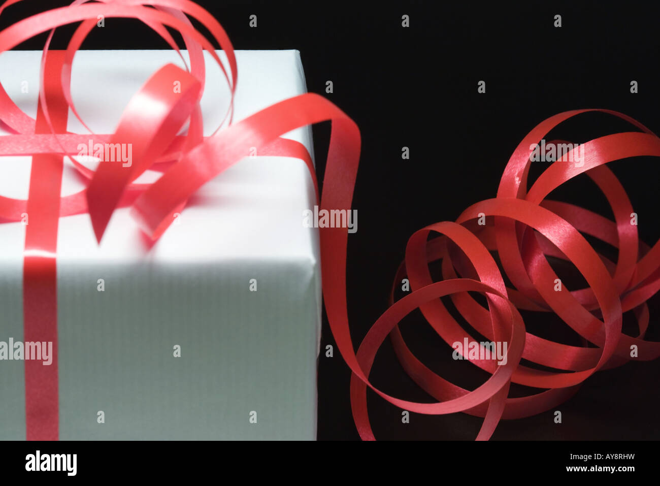 Gift wrapped in ribbon, close-up Stock Photo - Alamy