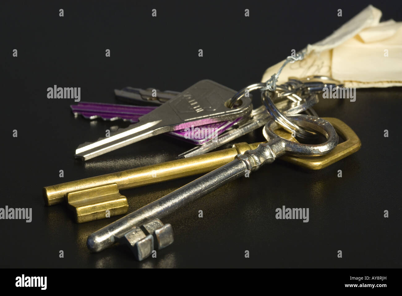 Assorted keys on key ring, close-up Stock Photo - Alamy