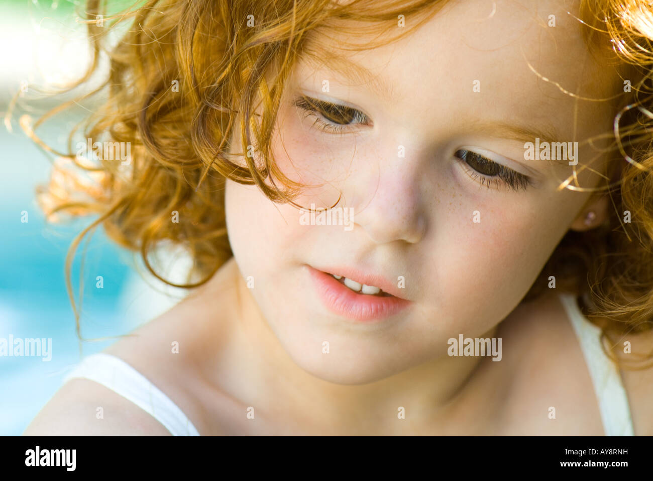 Little Girl With Red Curly Hair