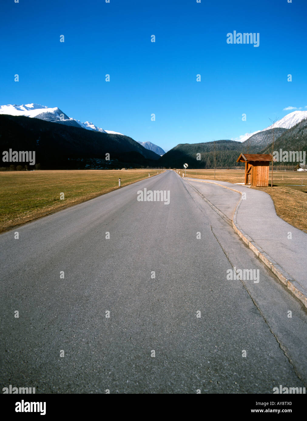 Road leading into the distant mountains and road without end Stock ...