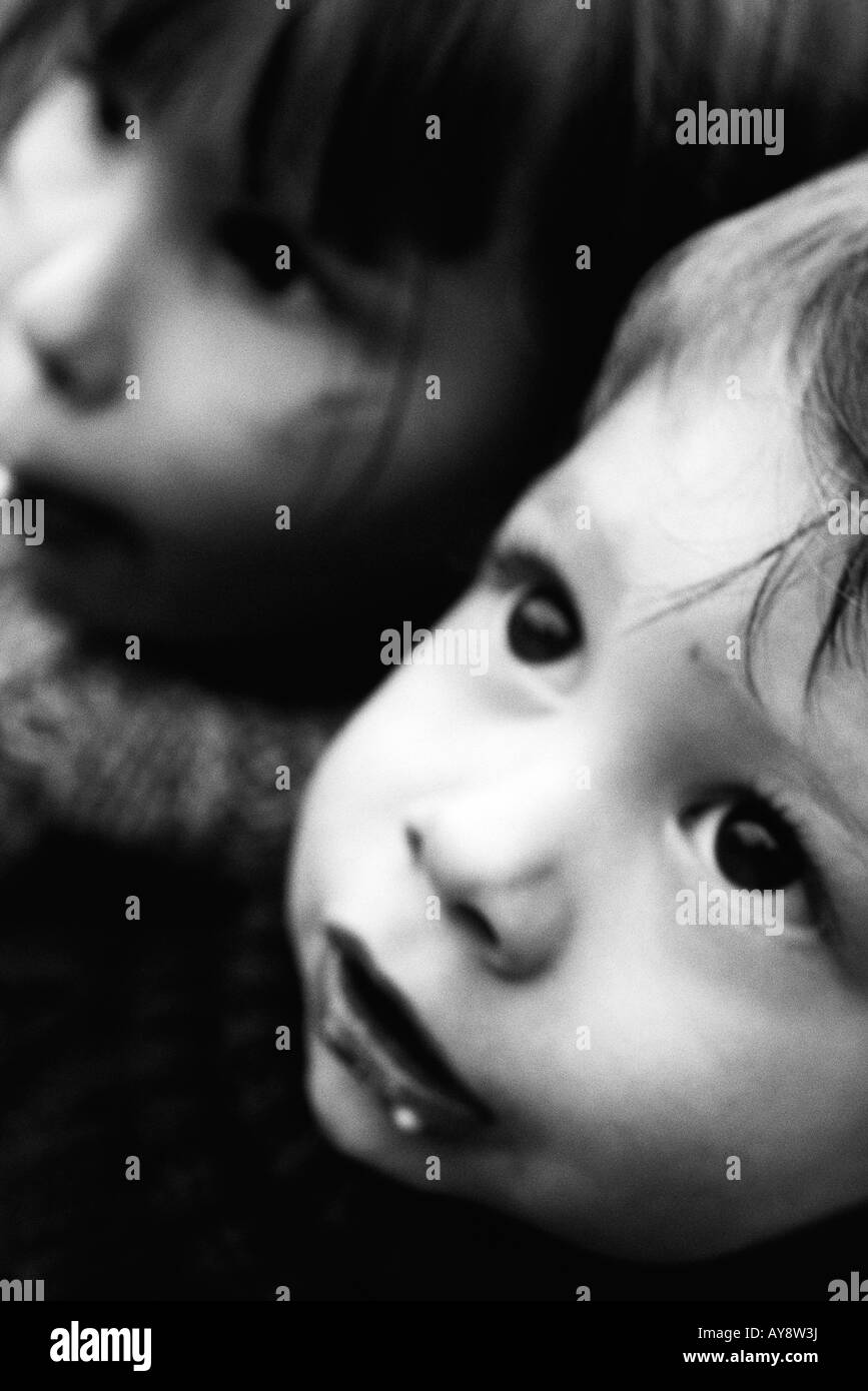 Two children looking up, portrait, close-up, cropped Stock Photo - Alamy