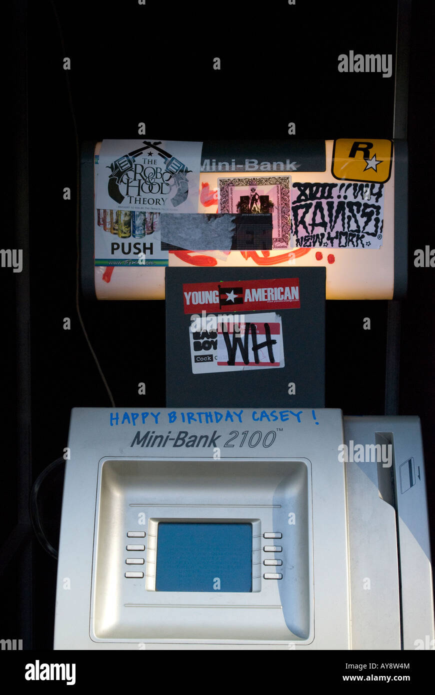 bank machine with graffiti Stock Photo - Alamy