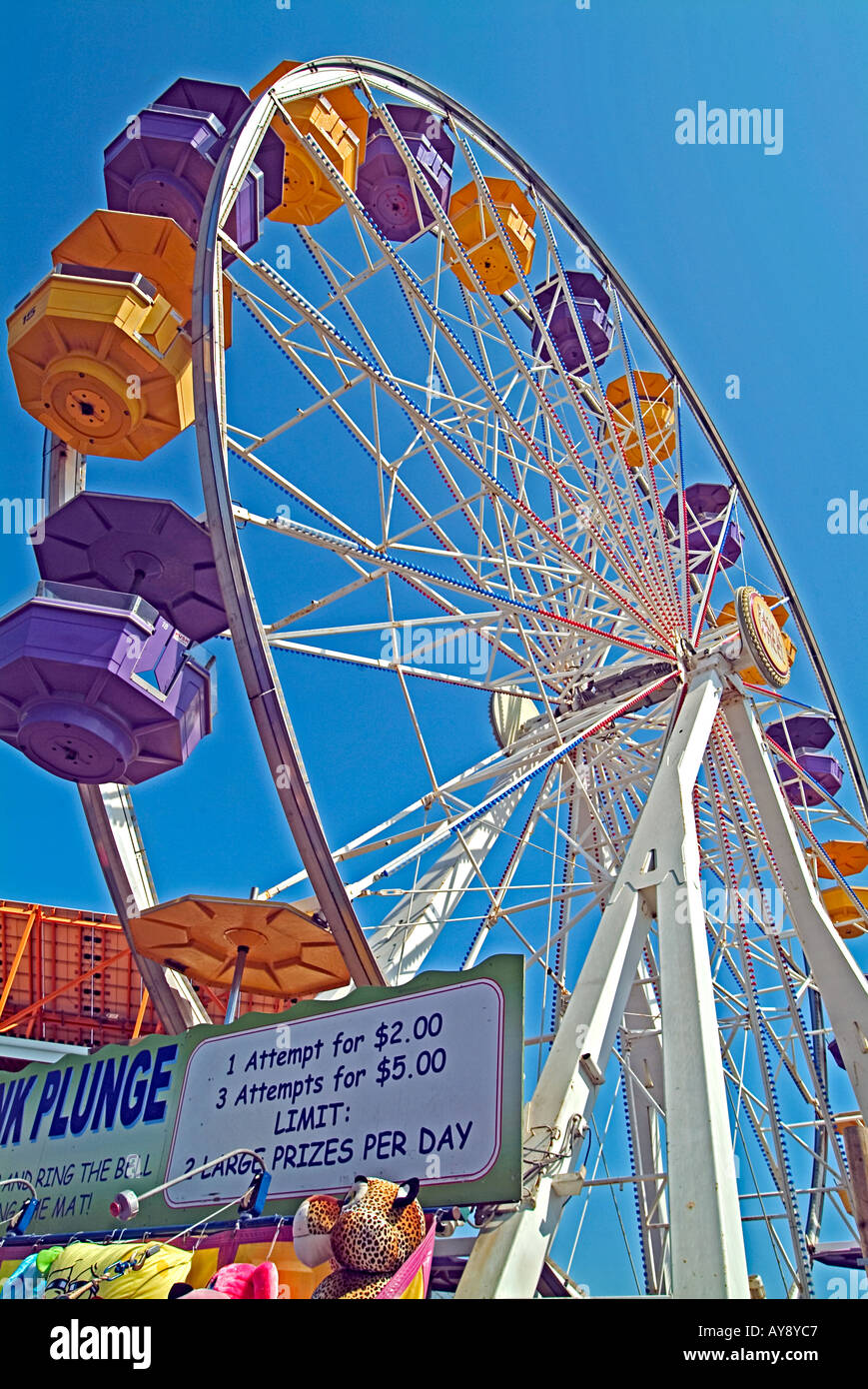 Looking up at Ferris wheel seats on the Santa Monica pier California CA ...