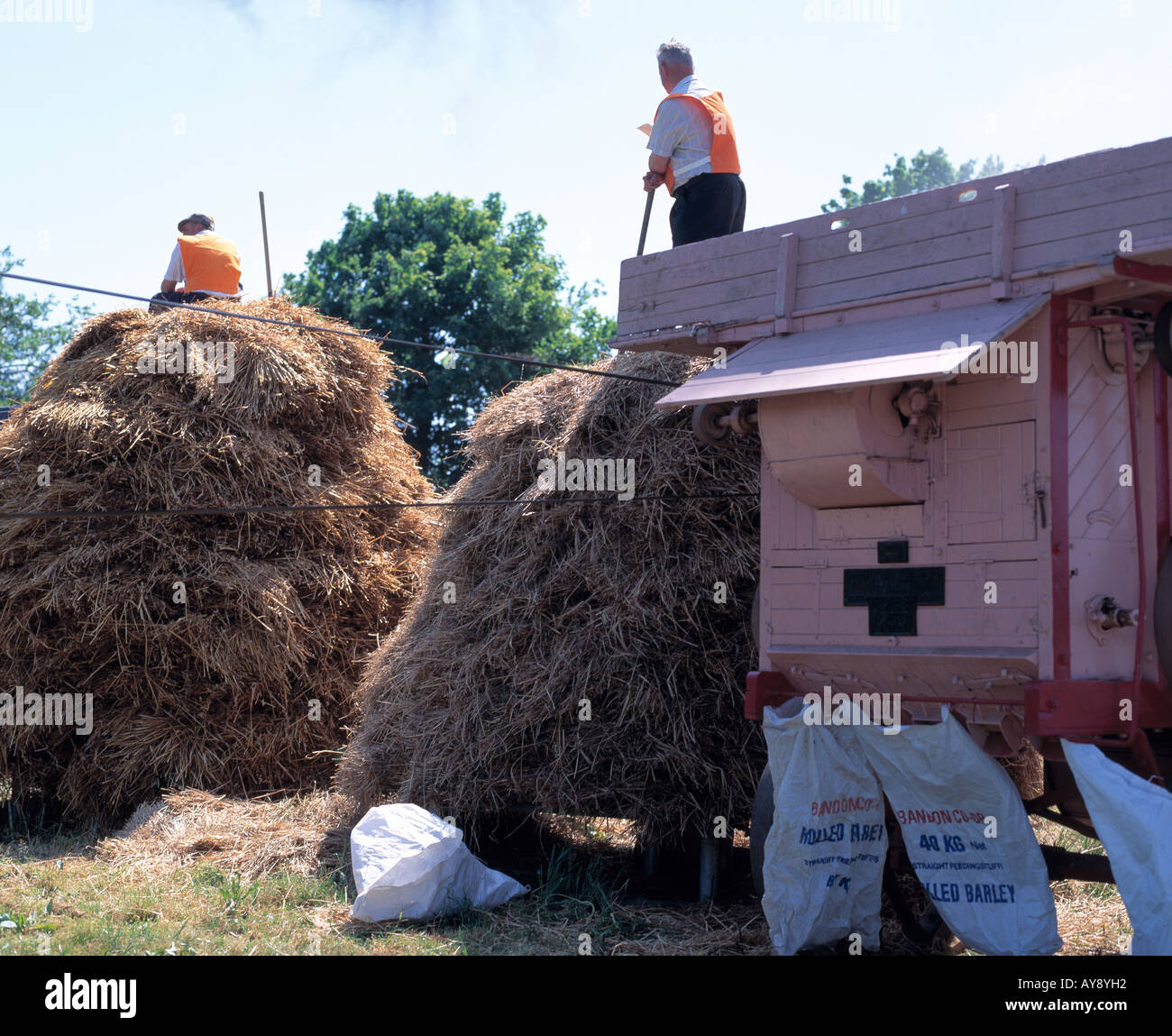 old fashioned farm trashing machines Stock Photo - Alamy