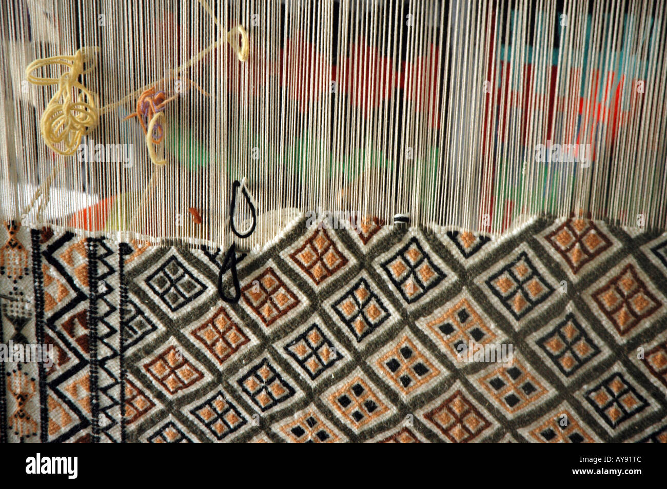 Machine to making carpets inside the carpet manufacture shop in ...