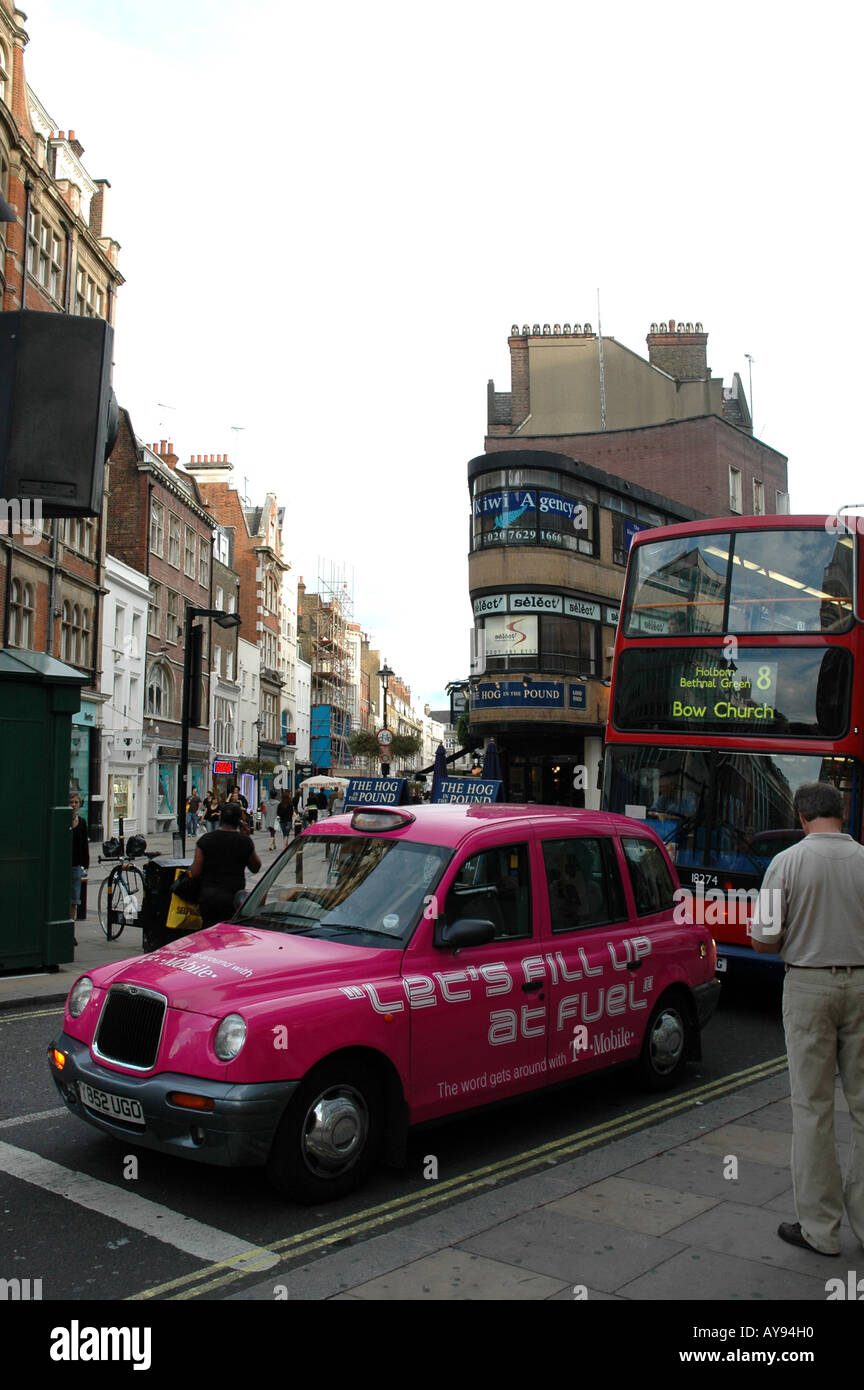 English cab at Oxford Street in London, UK Stock Photo - Alamy