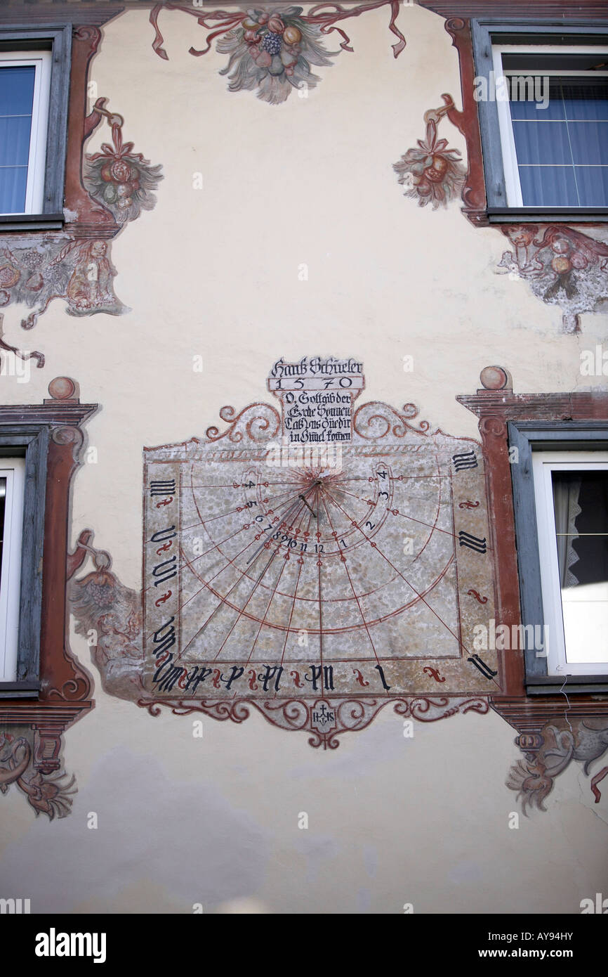A sundial, painted onto the outside wall of Alpine hotel Stock Photo ...