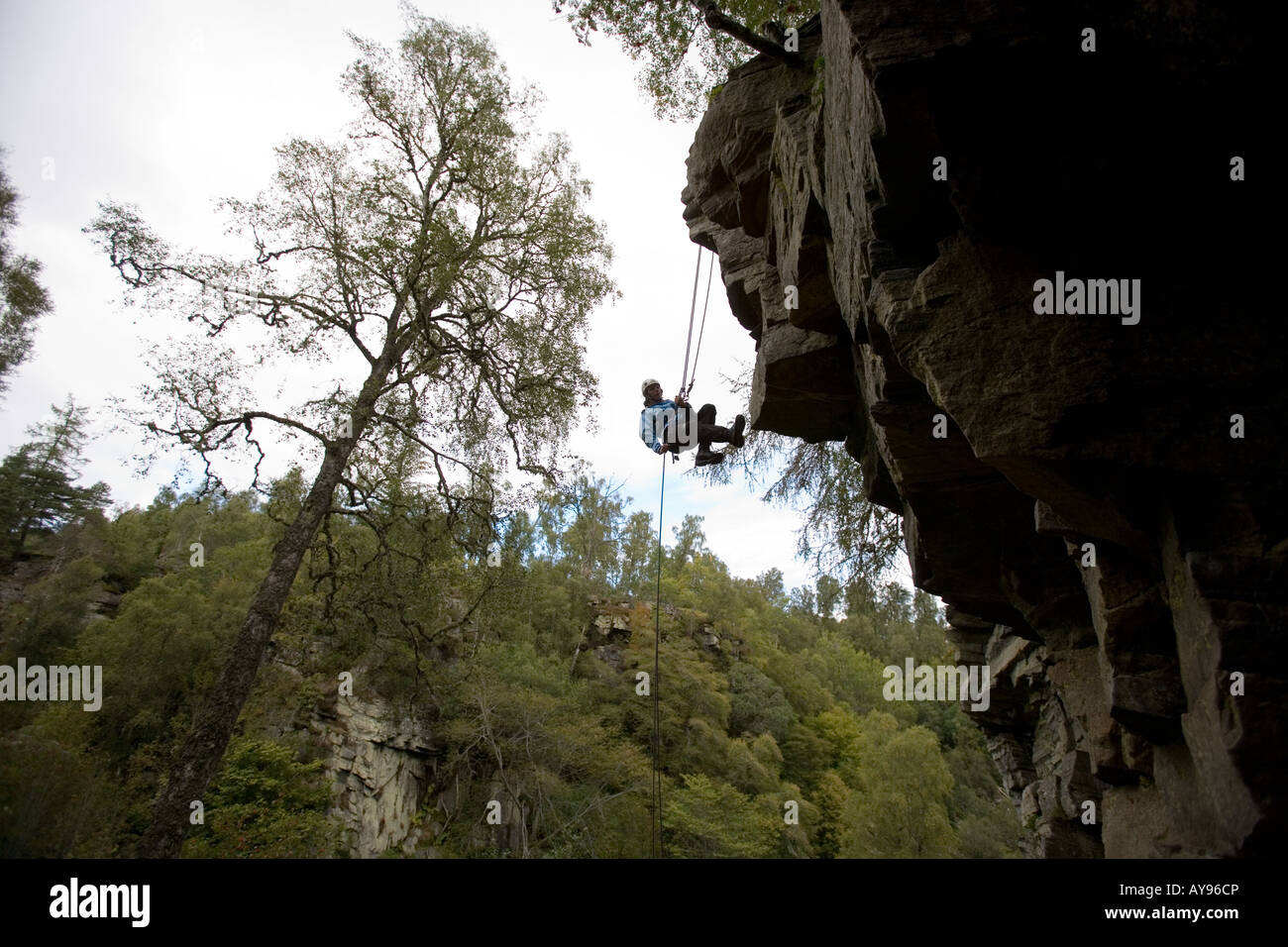 ABSEILING FROM OVERHANG IN AVIEMORE SCOTLAND Stock Photo - Alamy