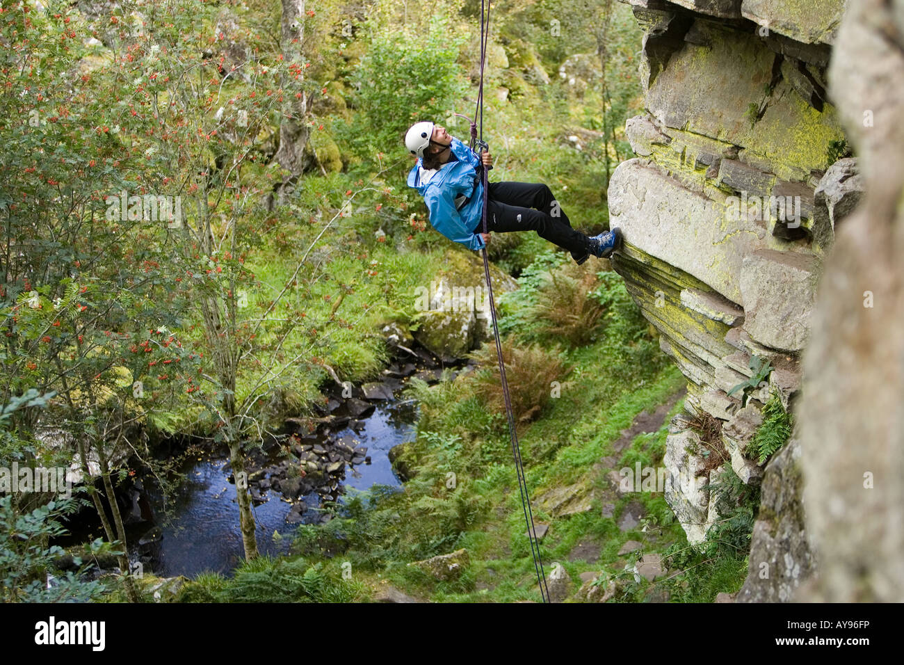 ABSEILING DOWN ROCK FACE IN AVIEMORE SCOTLAND Stock Photo - Alamy