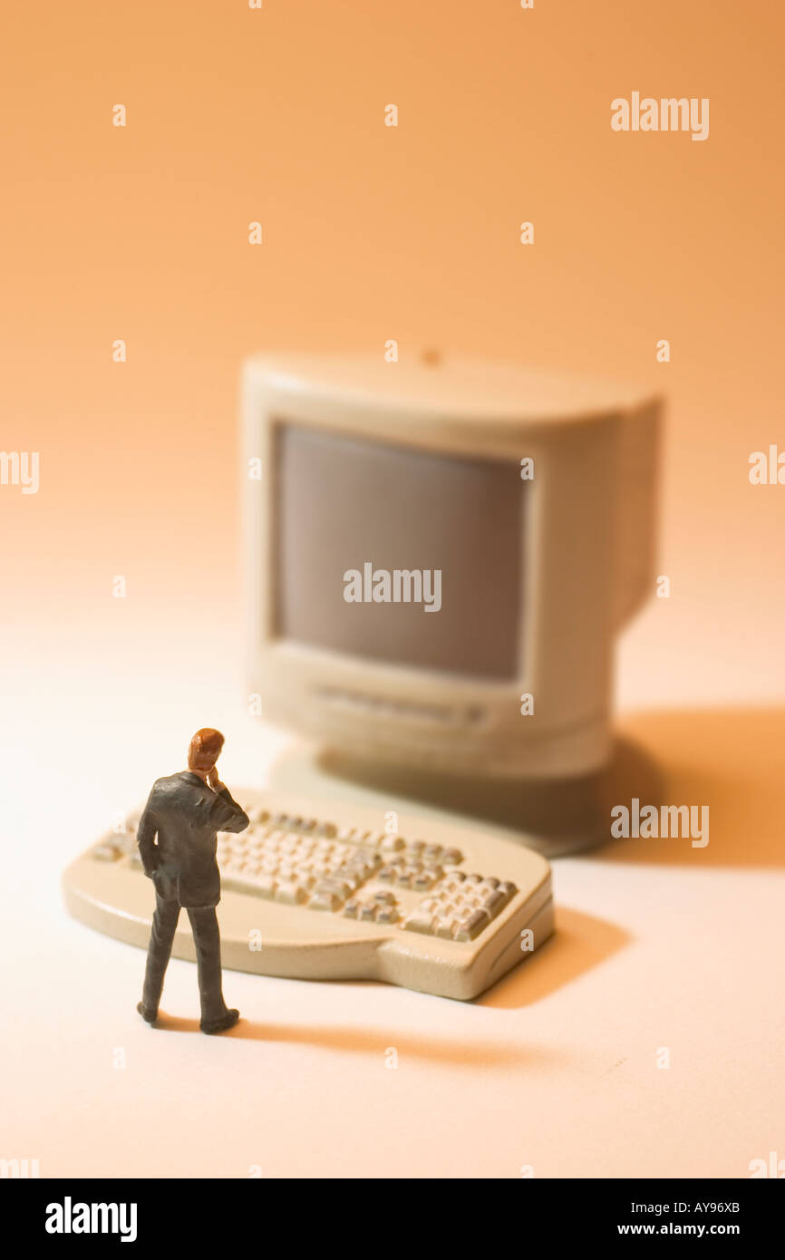 Miniature figures keyboard computer hi-res stock photography and images ...