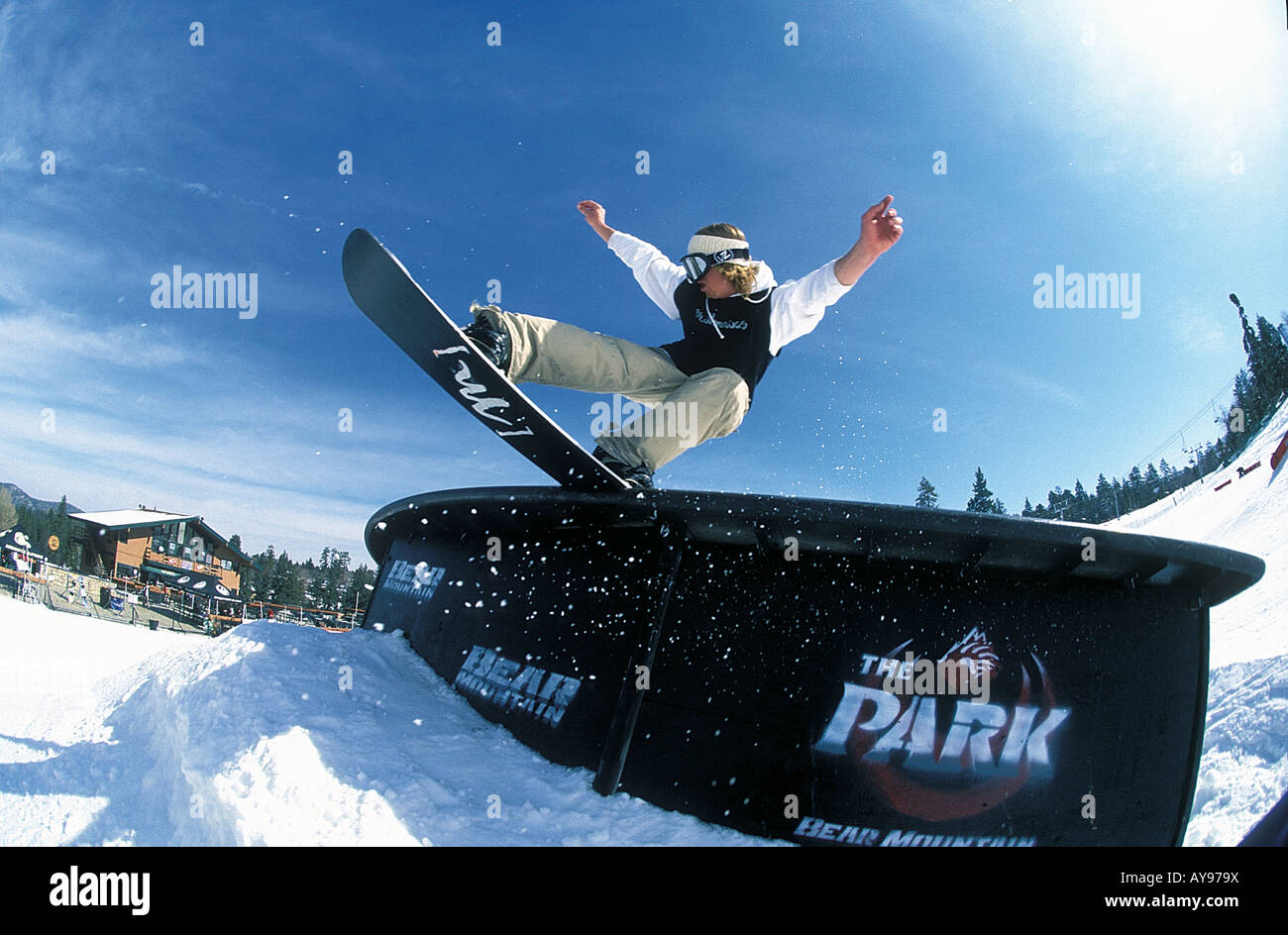 Snowboarder grinding rail hi-res stock photography and images - Alamy