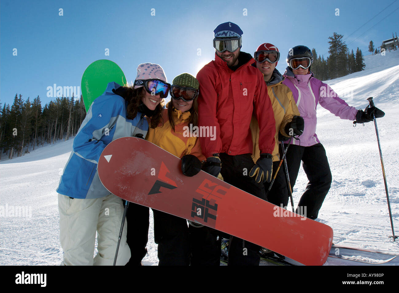 Group of friends on snowboarding and skiing holiday Stock Photo - Alamy