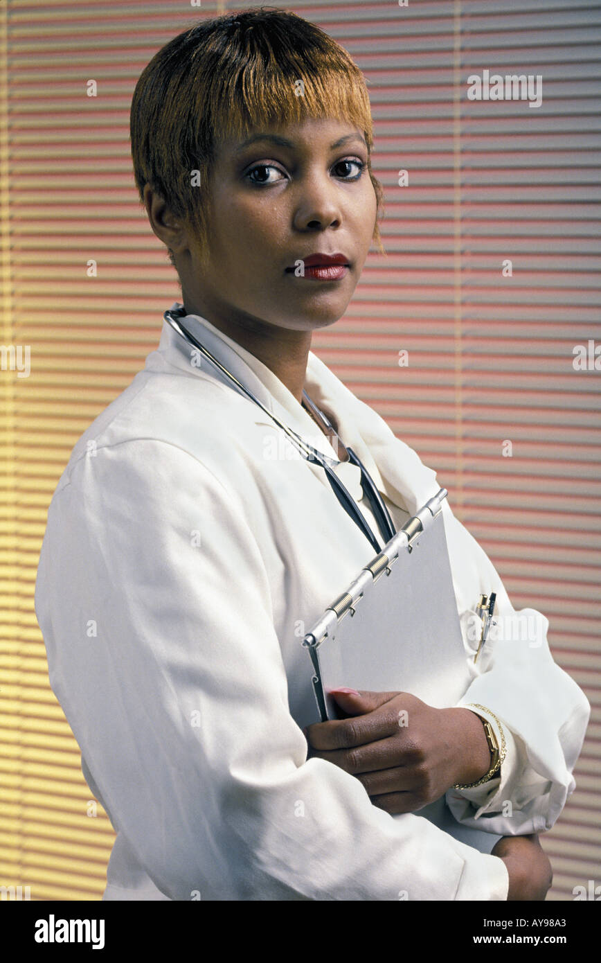 Female doctor holding stethescope hi-res stock photography and images ...