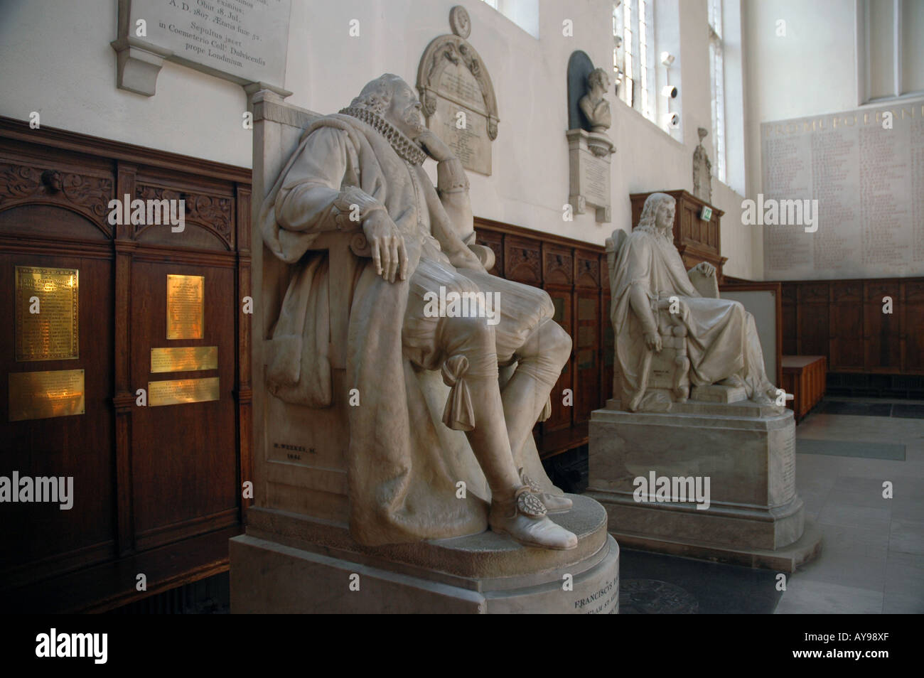 Statue of Isaac Barrow (R) in Trinity College chapel, Cambridge UK ...
