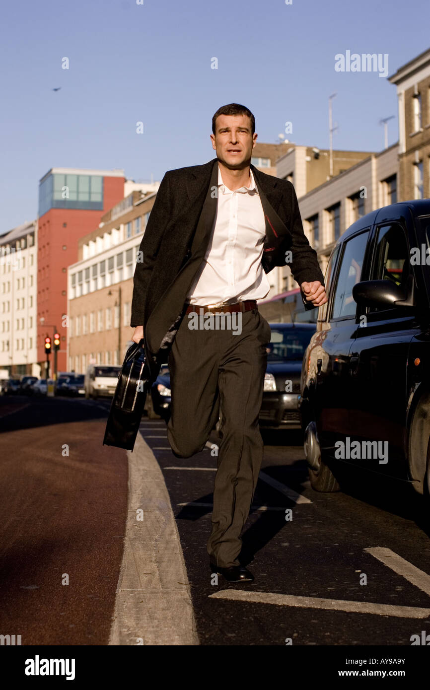 CITY TRADER / BUSINESSMAN RUNNING Stock Photo - Alamy