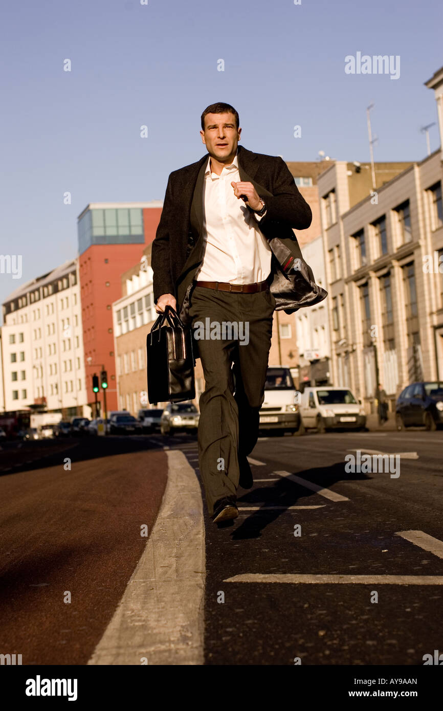 CITY TRADER / BUSINESSMAN RUNNING Stock Photo - Alamy