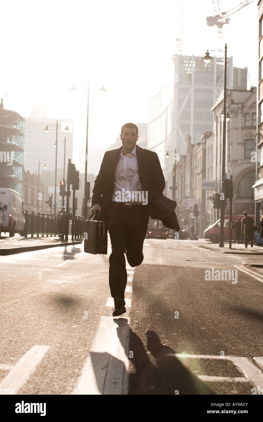 CITY TRADER BUSINESSMAN RUNNING Stock Photo - Alamy