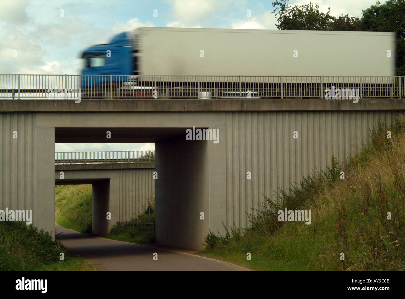 articulated lorry drives over concrete bridge Nr Cirencester ...