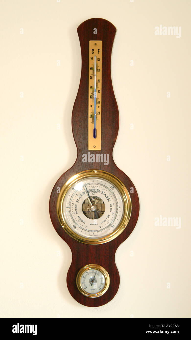 full length wood and brass barometer Stock Photo - Alamy