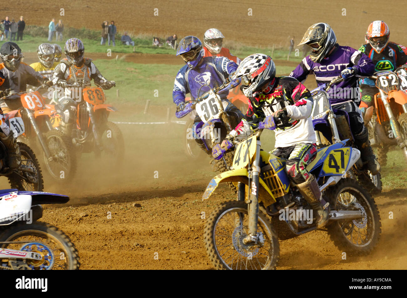 a guy rider on a motocross bile motorcycle jumping and racing big air ...