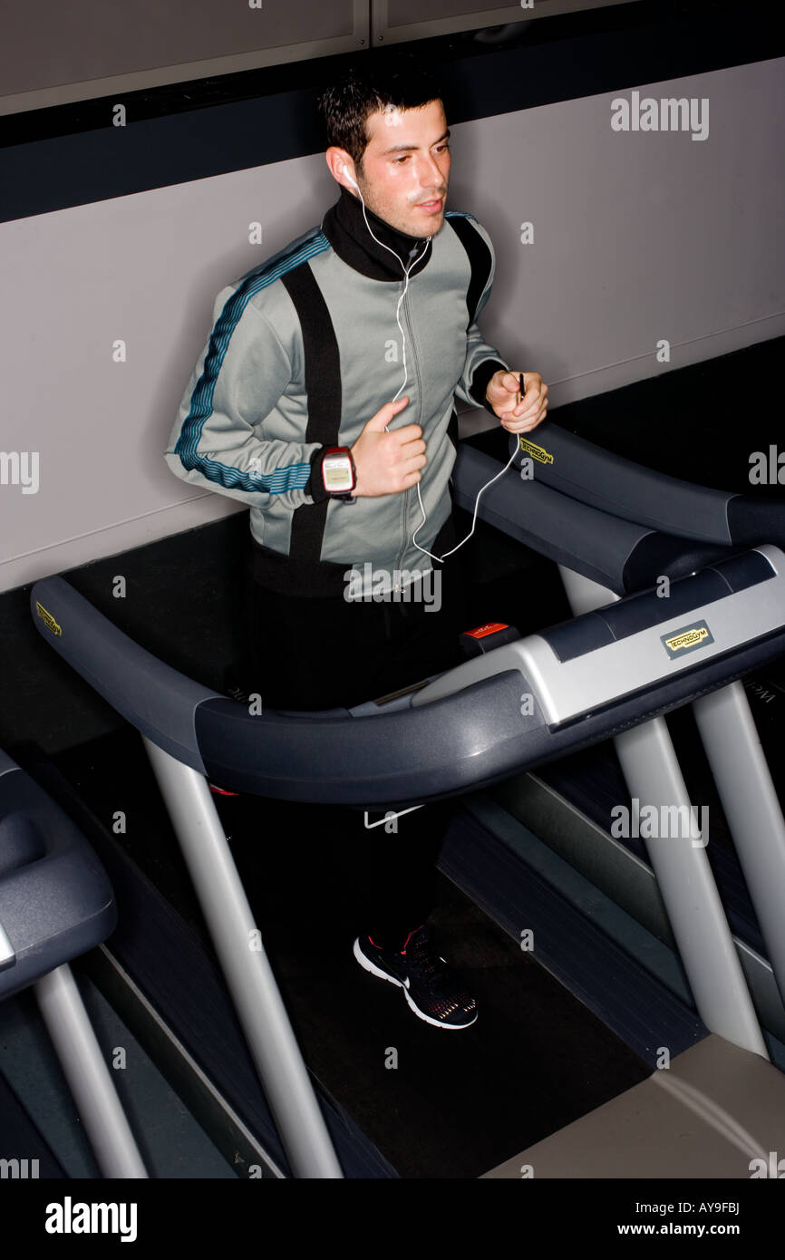 Man on running machine, health and fitness Stock Photo - Alamy