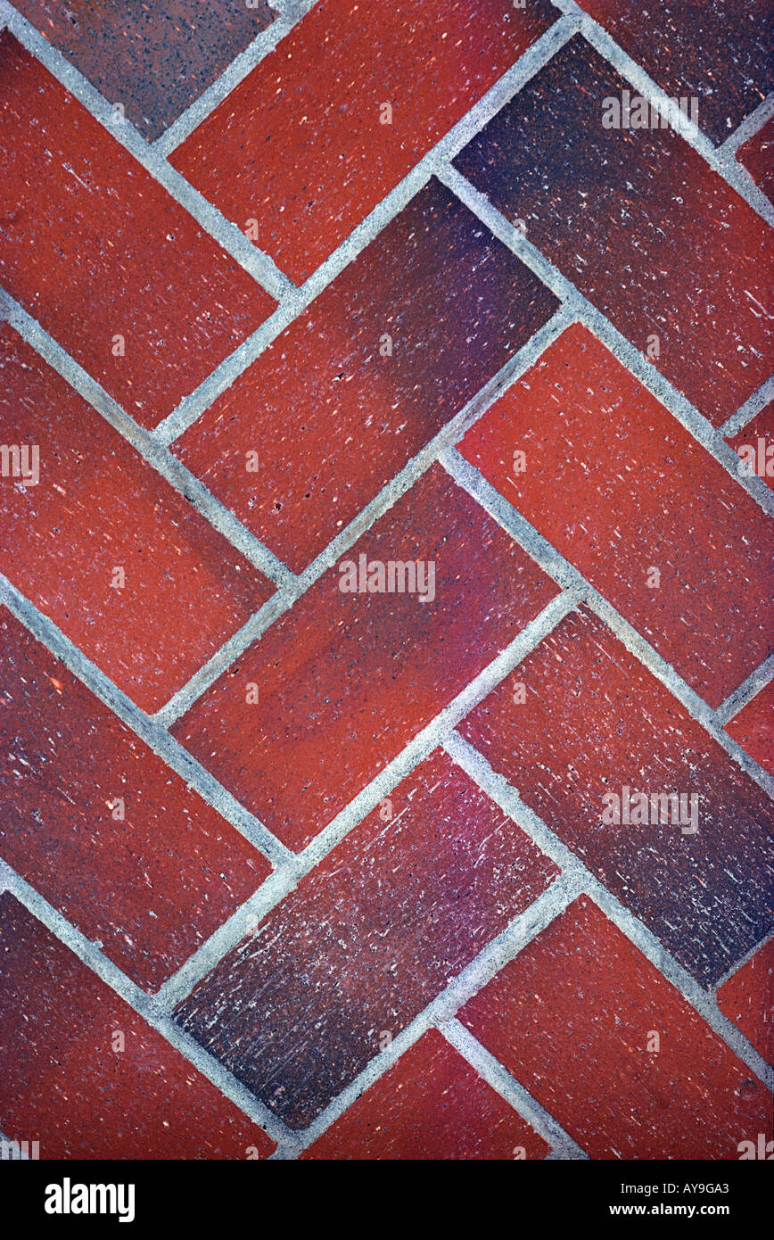 Close up of bricks laid in a repeating pattern vertical format Stock ...