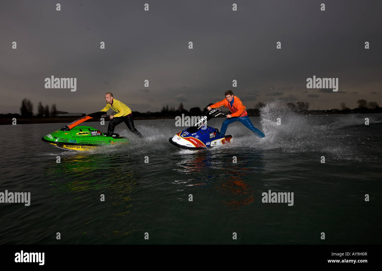 Two men racing jet skis, speed and rivalry Stock Photo - Alamy